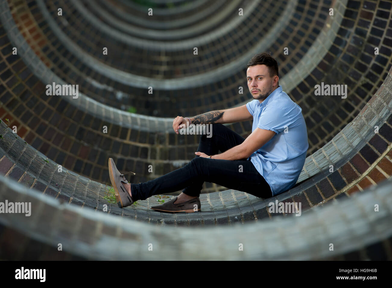 Singer, songwriter Jamie Mathias poses with his guitar for a shoot at ...