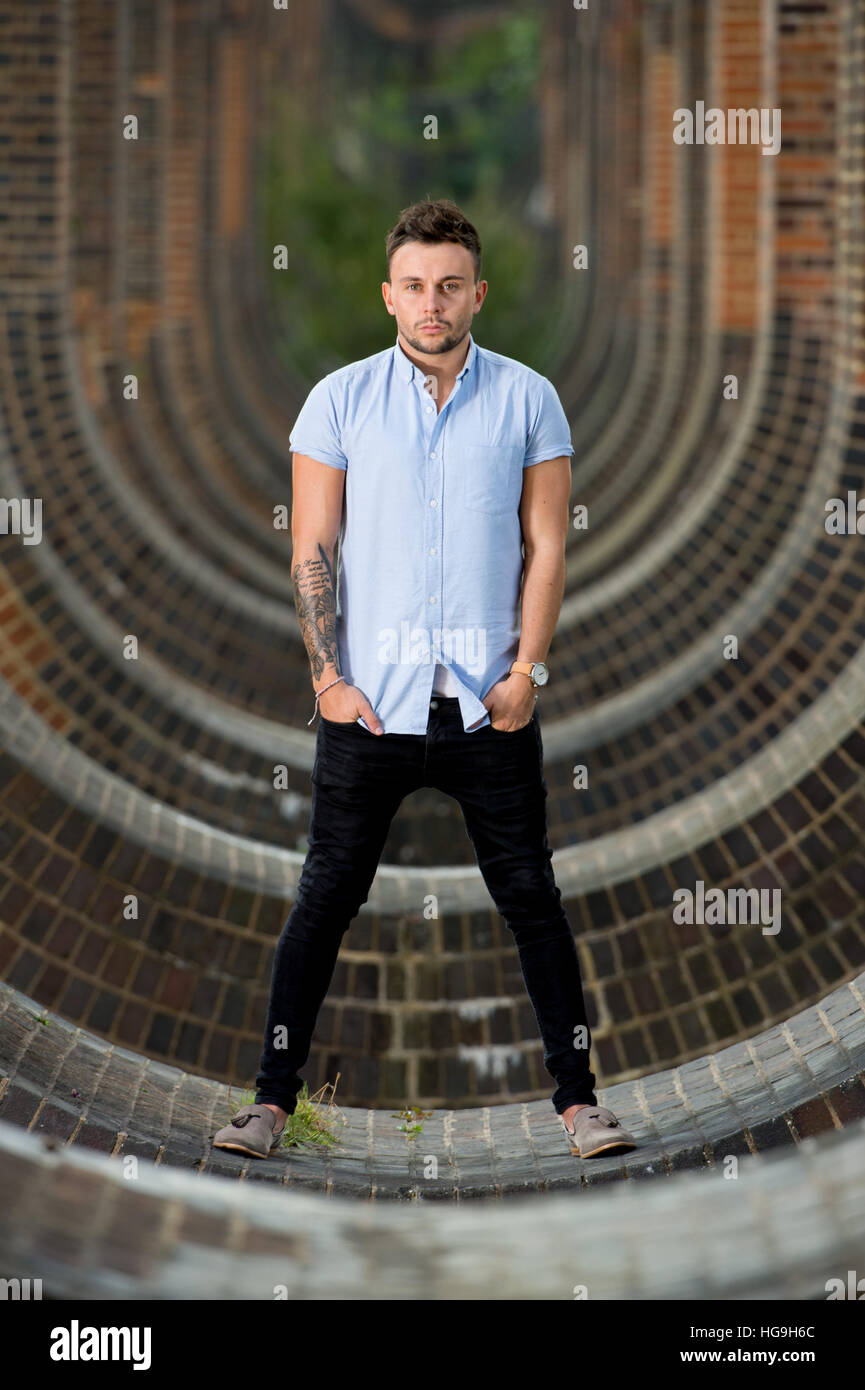 Singer, songwriter Jamie Mathias poses with his guitar for a shoot at ...