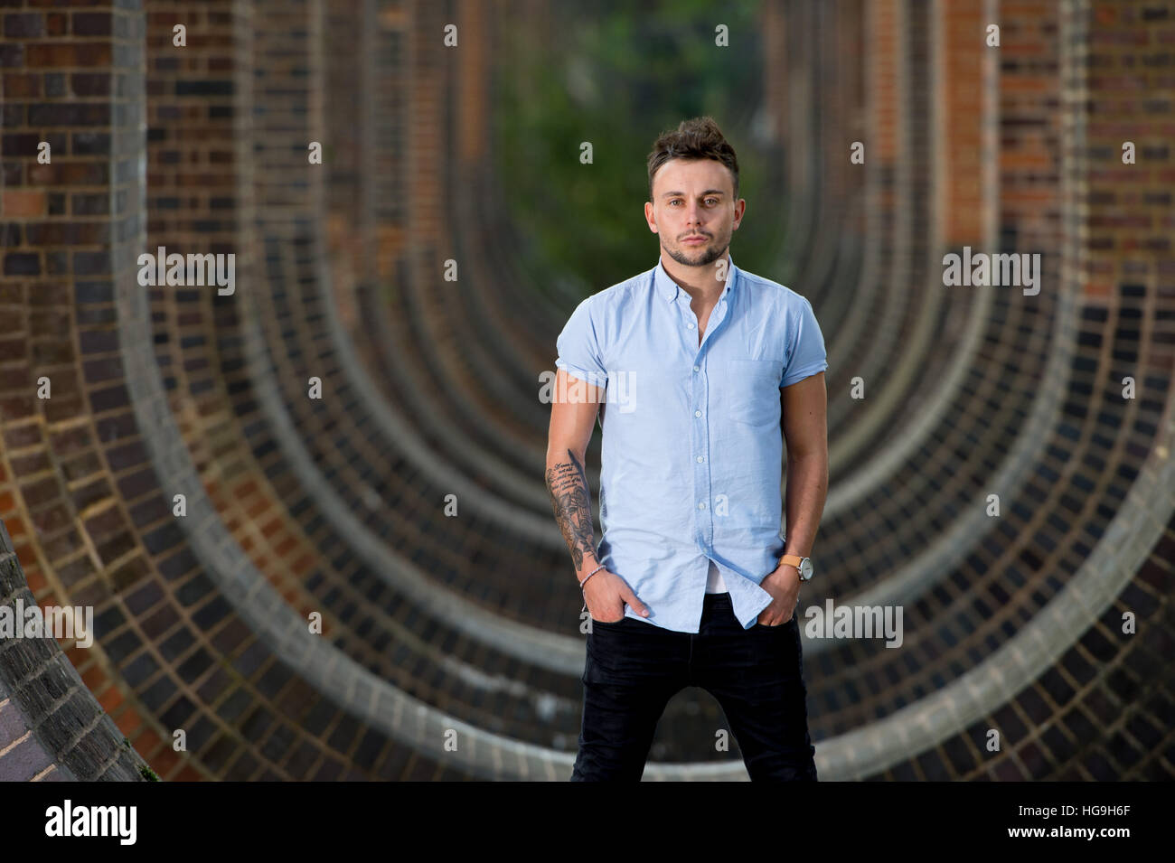 Singer, songwriter Jamie Mathias poses with his guitar for a shoot at ...