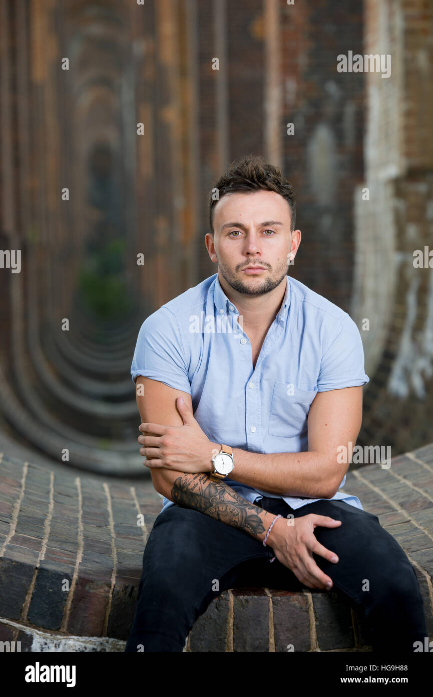 Singer, songwriter Jamie Mathias poses with his guitar for a shoot at ...