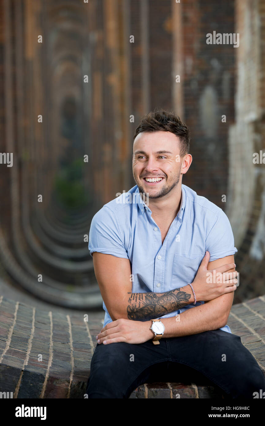 Singer, songwriter Jamie Mathias poses with his guitar for a shoot at ...