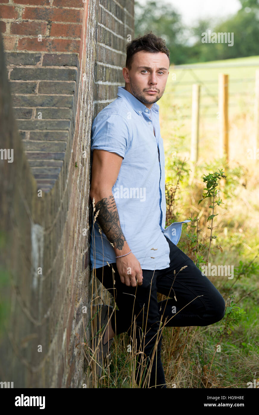 Singer, songwriter Jamie Mathias poses with his guitar for a shoot at ...
