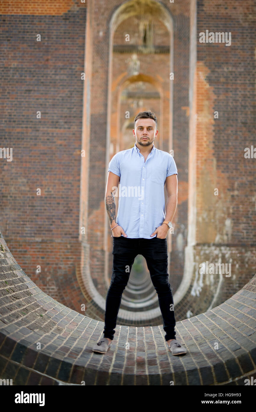 Singer, songwriter Jamie Mathias poses with his guitar for a shoot at ...