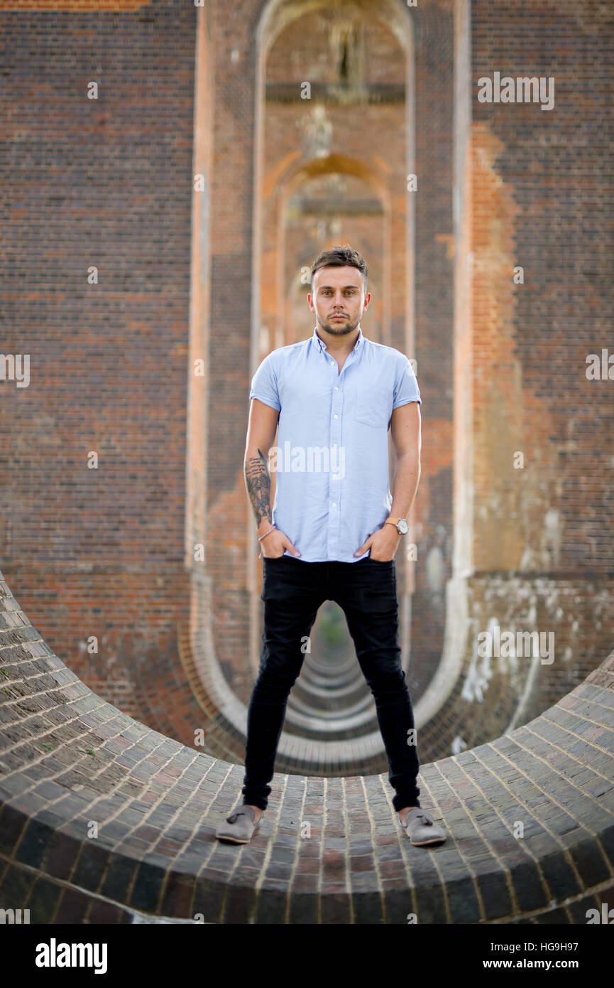 Singer, songwriter Jamie Mathias poses with his guitar for a shoot at ...