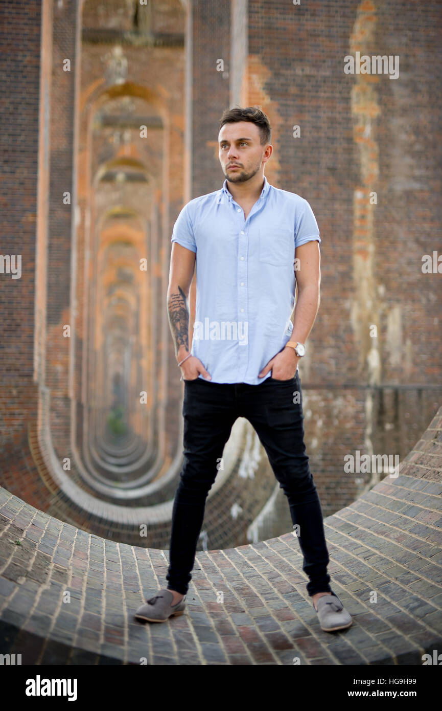 Singer, songwriter Jamie Mathias poses with his guitar for a shoot at ...