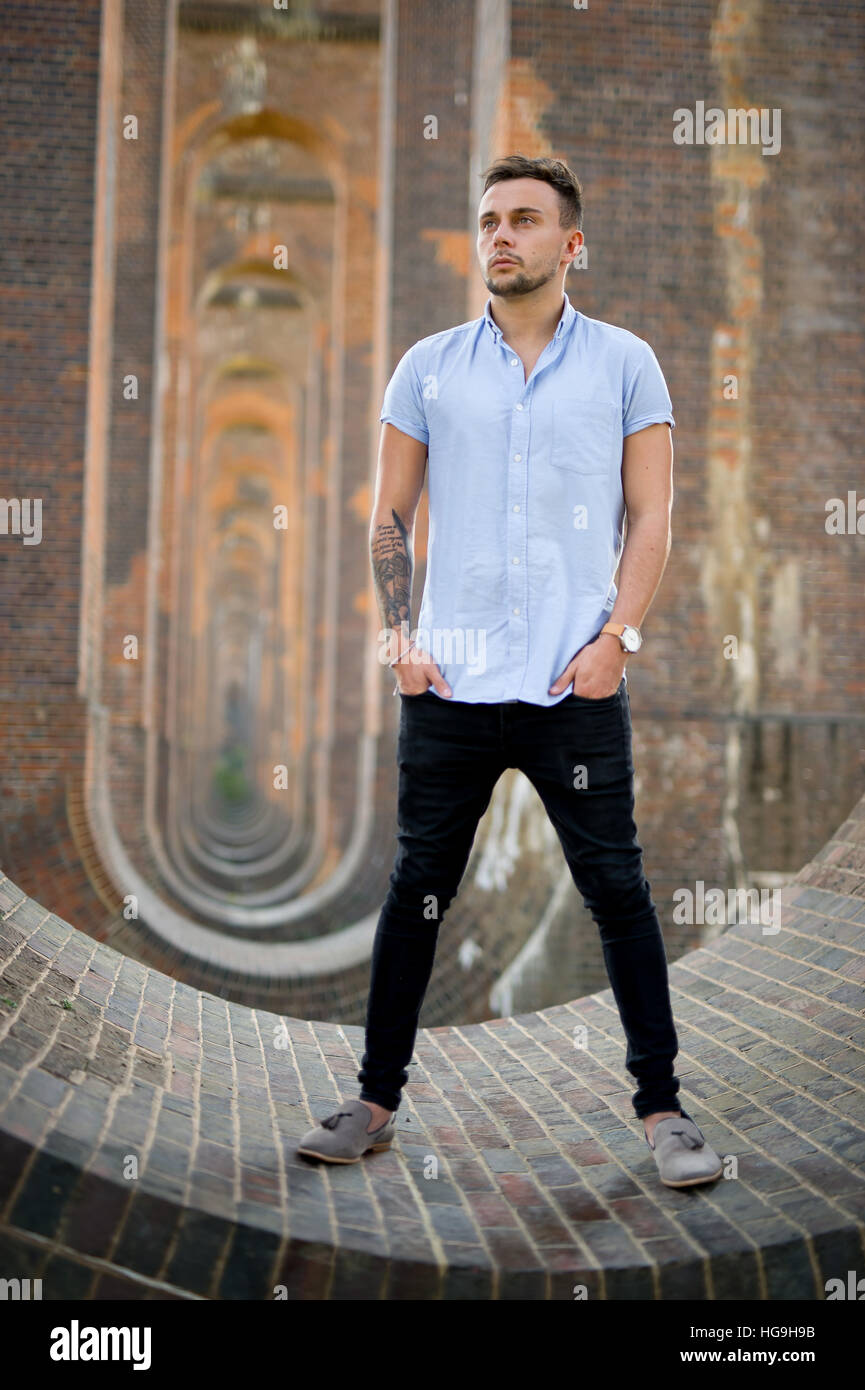 Singer, songwriter Jamie Mathias poses with his guitar for a shoot at ...