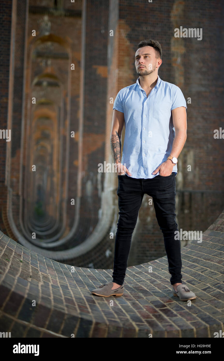 Singer, songwriter Jamie Mathias poses with his guitar for a shoot at ...