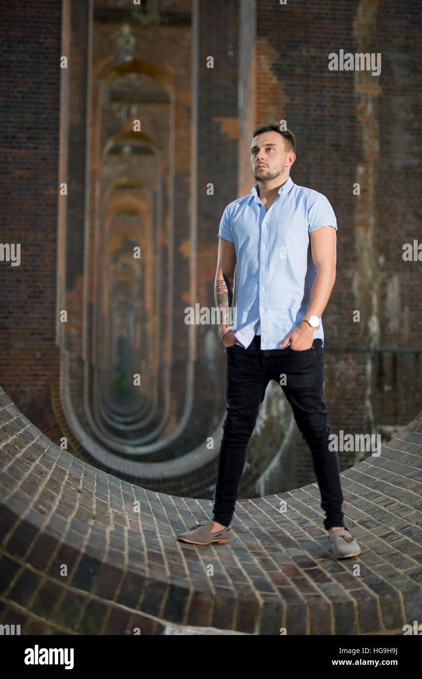 Singer, songwriter Jamie Mathias poses with his guitar for a shoot at ...