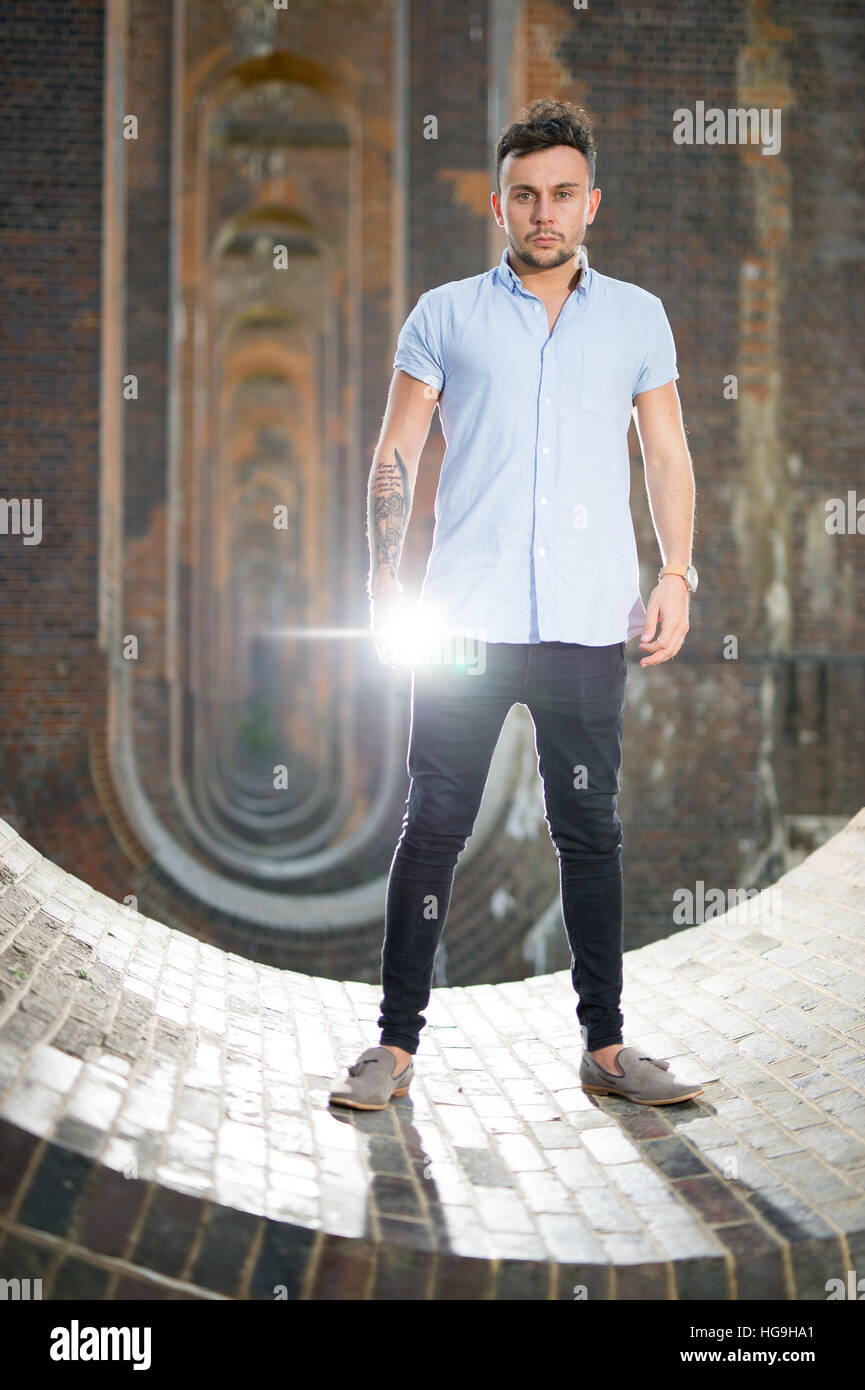 Singer, songwriter Jamie Mathias poses with his guitar for a shoot at ...
