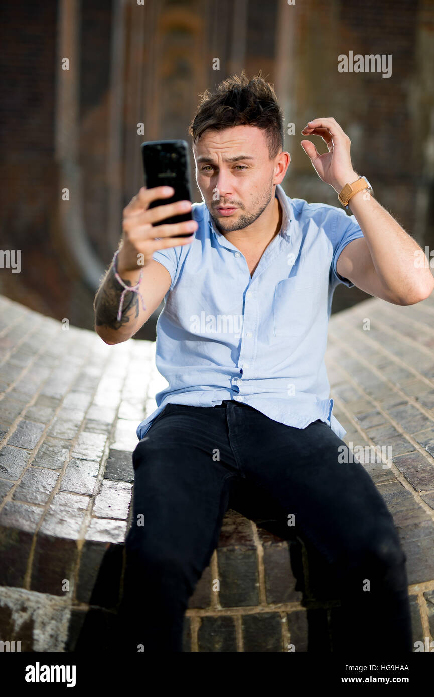 Singer, songwriter Jamie Mathias poses with his guitar for a shoot at ...