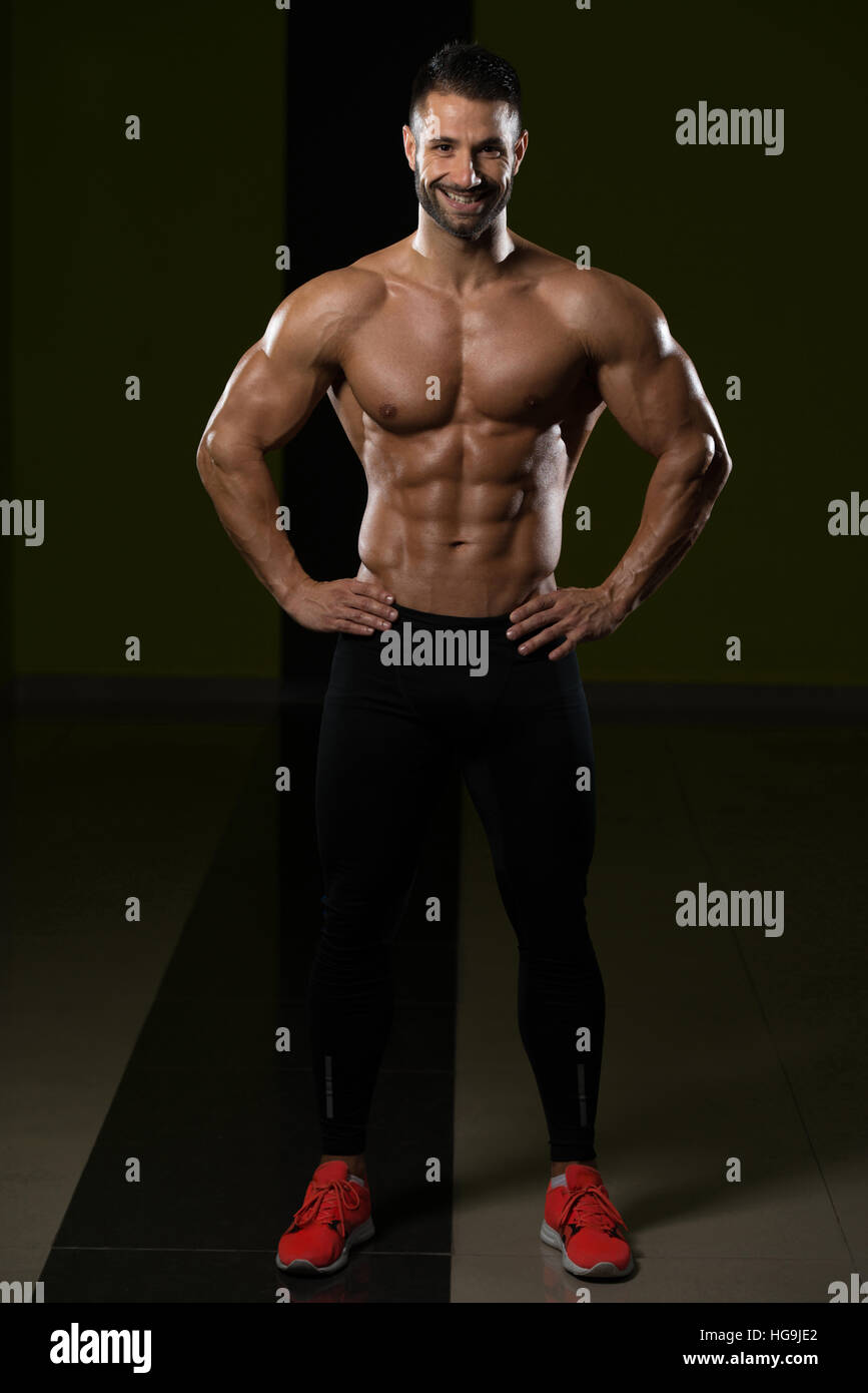 Portrait Of A Young Physically Fit Man Showing His Well Trained Body ...