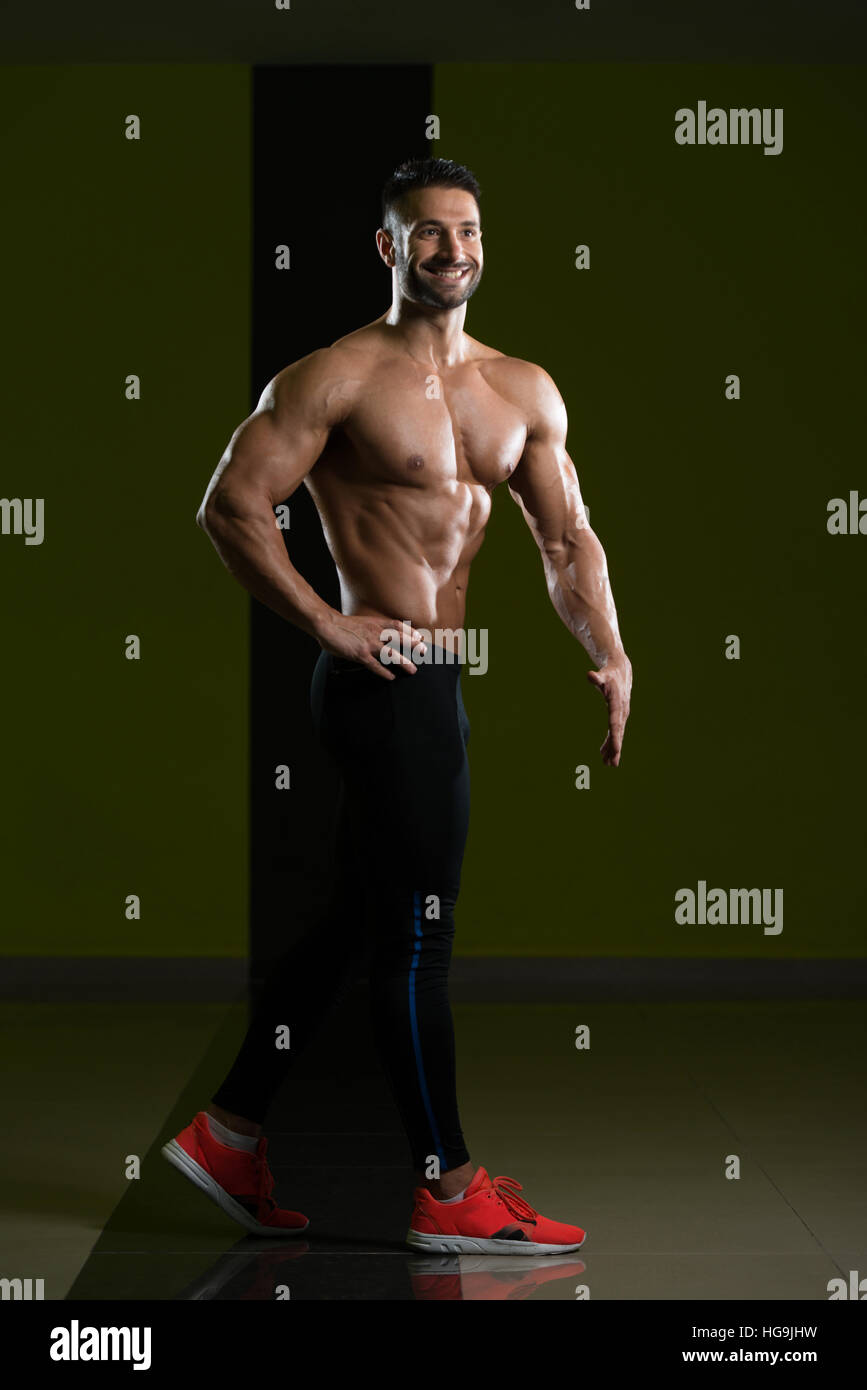 Portrait Of A Young Physically Fit Man Showing His Well Trained Body ...