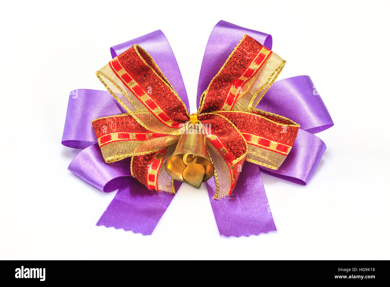 bell and ribbon with bow isolated on white Stock Photo - Alamy