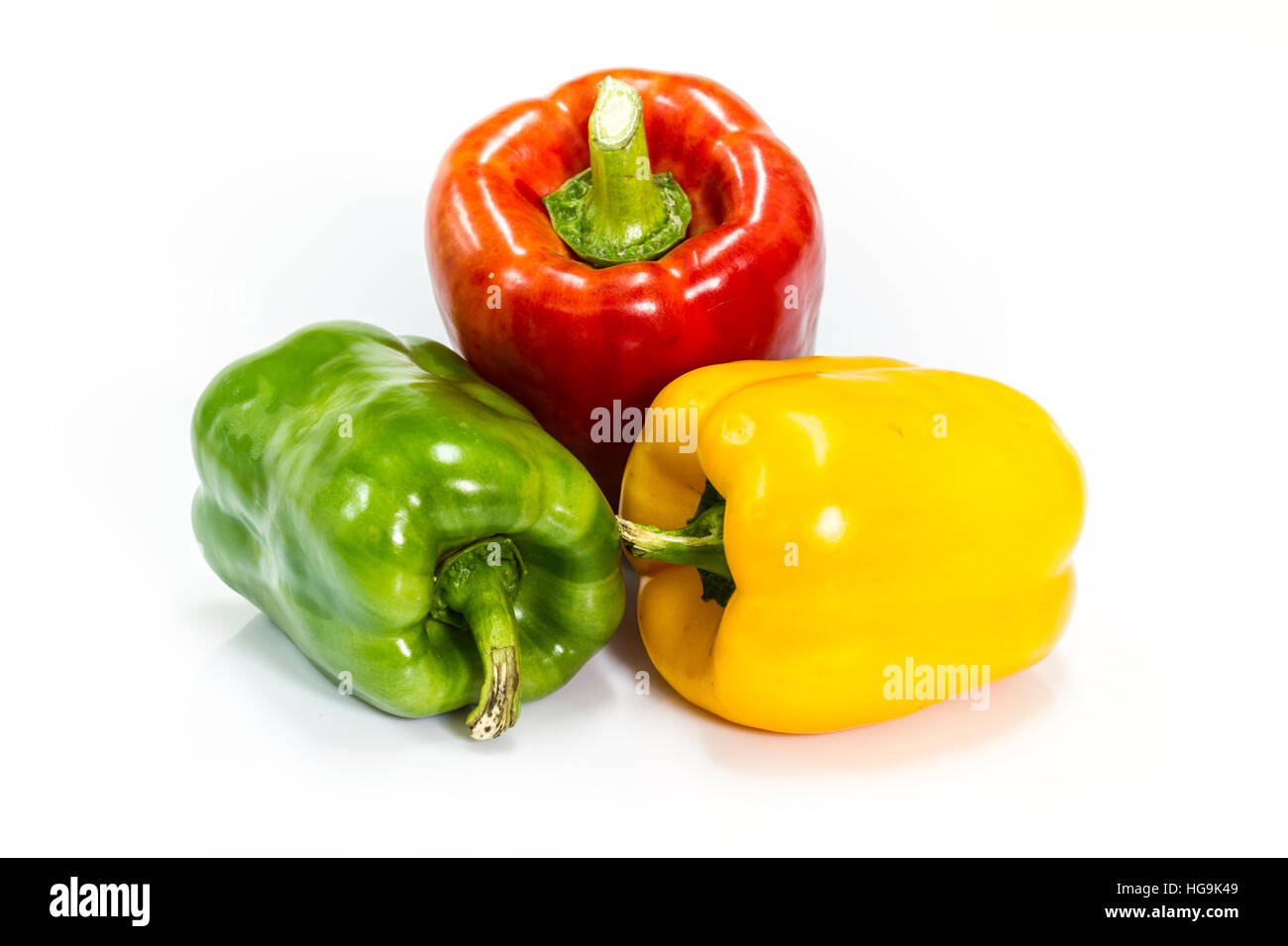 colored peppers over white background, Fresh vegetables sweet Peppers ...