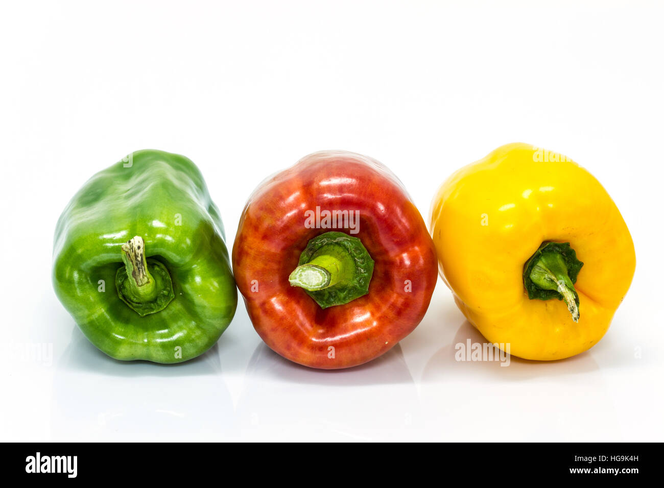colored peppers over white background, Fresh vegetables sweet Peppers ...