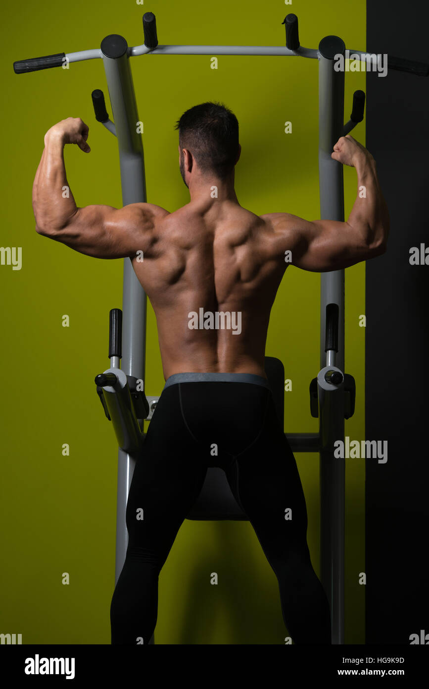 Portrait Of A Young Physically Fit Man Showing His Well Trained Body ...