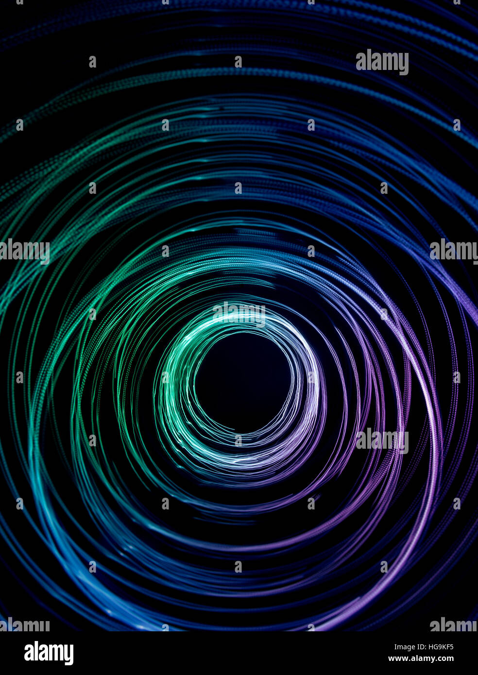 Colorful abstract trails of light. Dots, lines and bokeh on dark background. Long exposure Stock ...