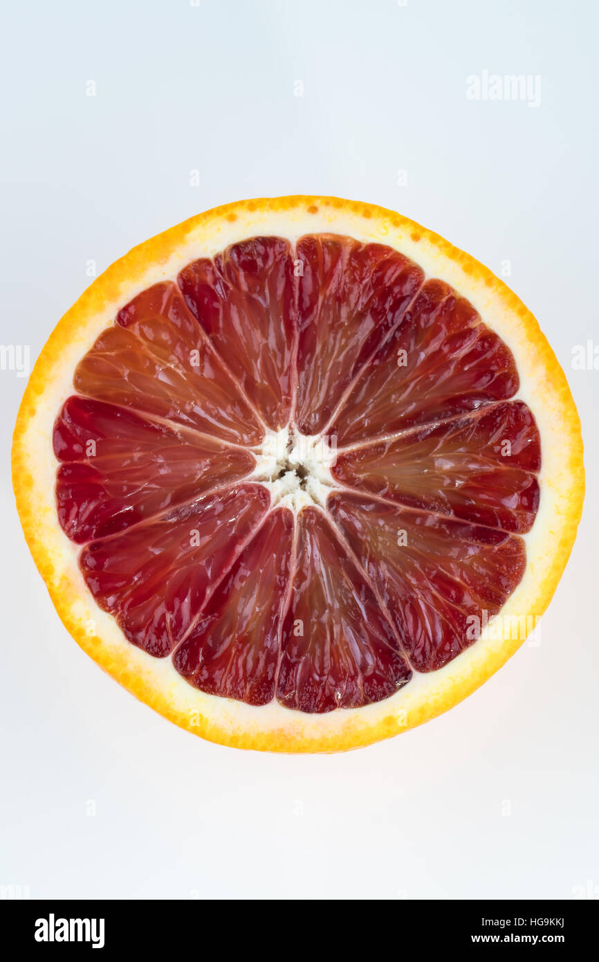 Single half of a blood orange isolated on a white background Stock ...