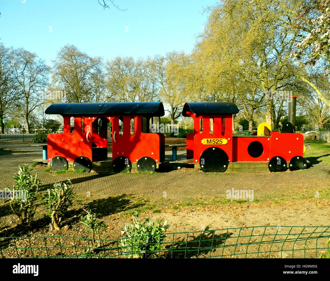 Playground toy train in a local park Stock Photo - Alamy