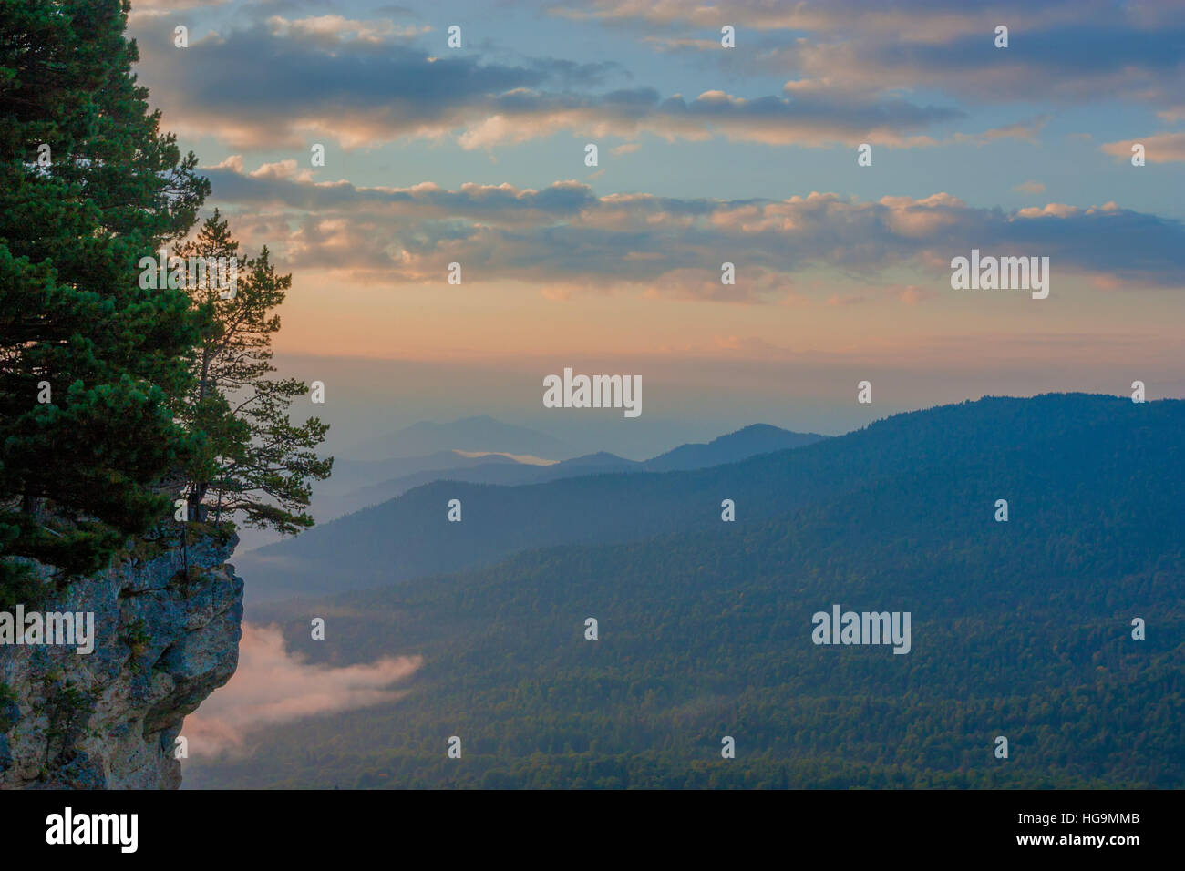 Scenic mountain landscape with sunset and dramatic sky Stock Photo - Alamy