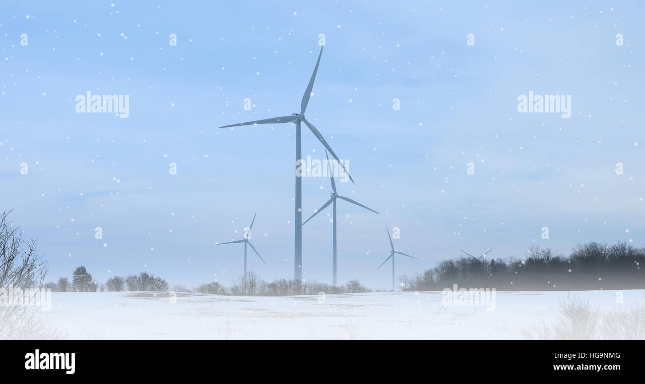 Snow falling with wind turbines in background Stock Photo - Alamy