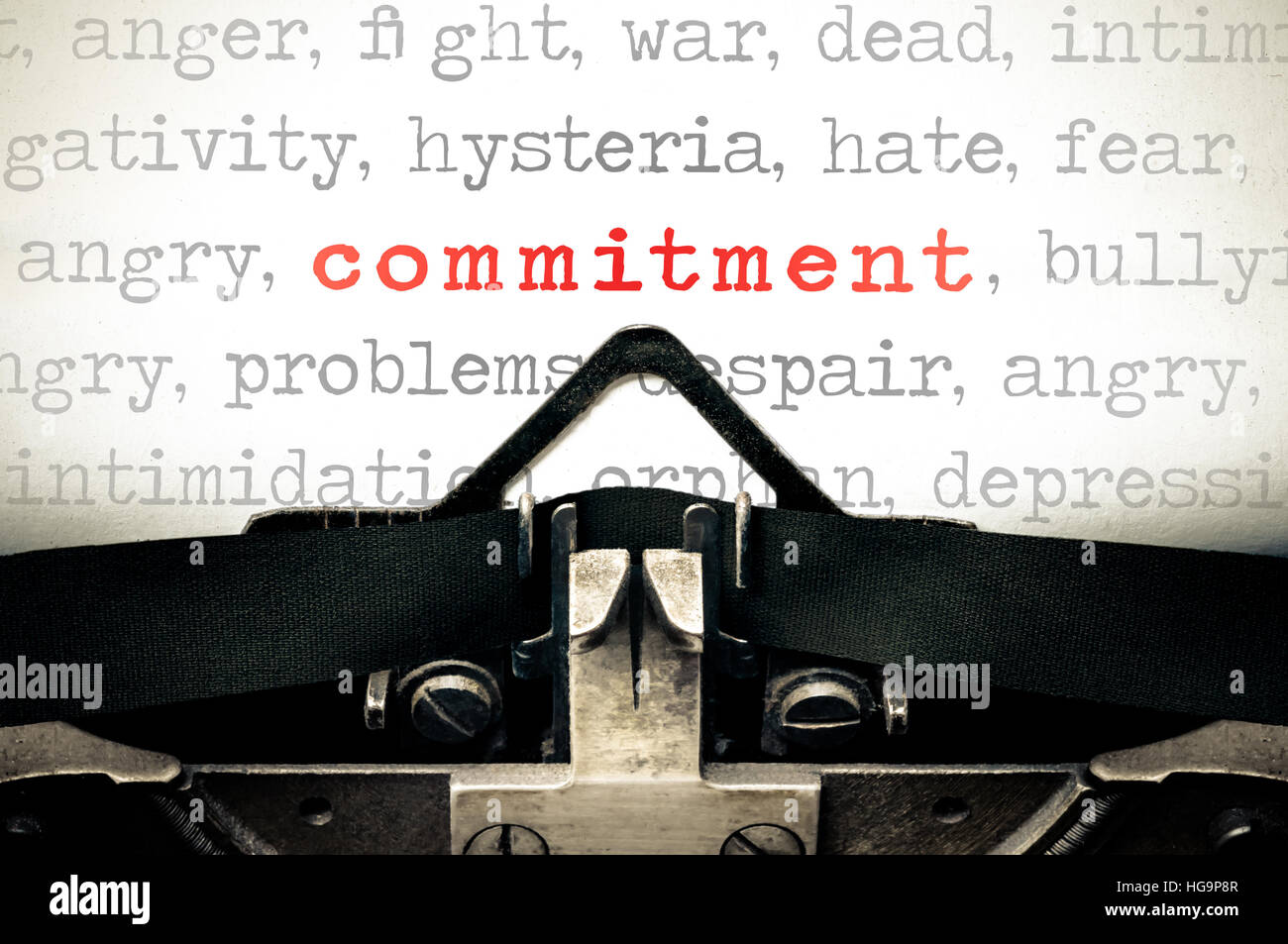 Typewriter written message with the word commitment Stock Photo - Alamy