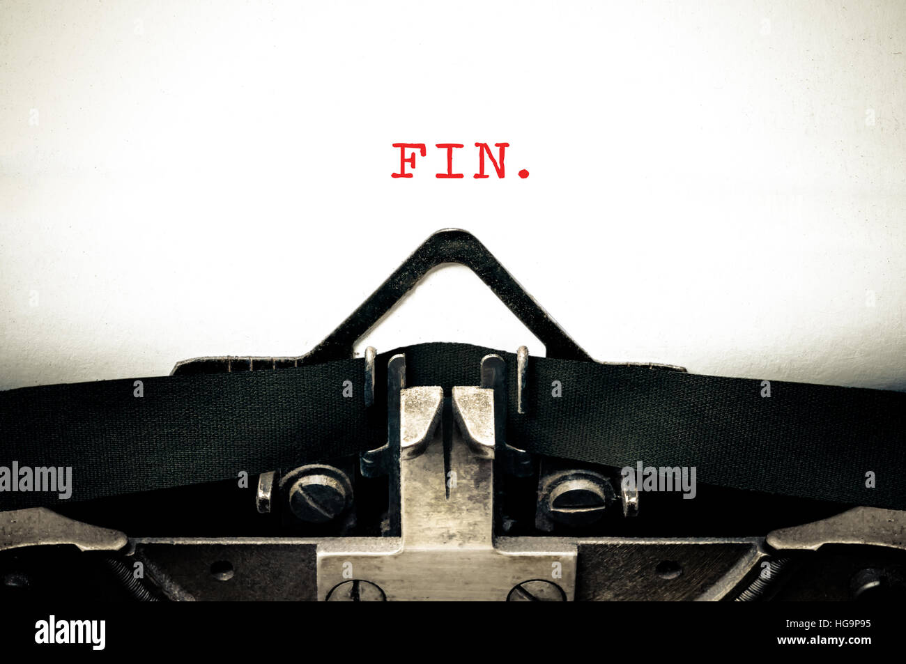 Typewriter written message with the spanish word FIN Stock Photo - Alamy