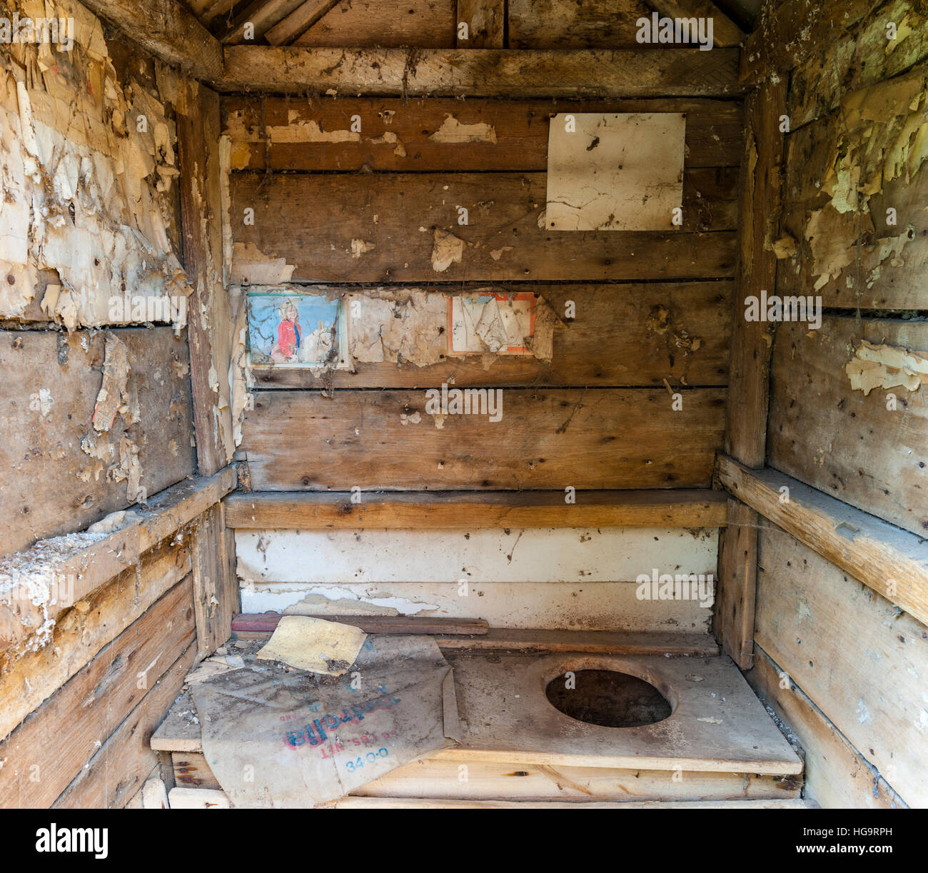 Inside of an abandoned outhouse in a farm in rural Ontario, Canada ...