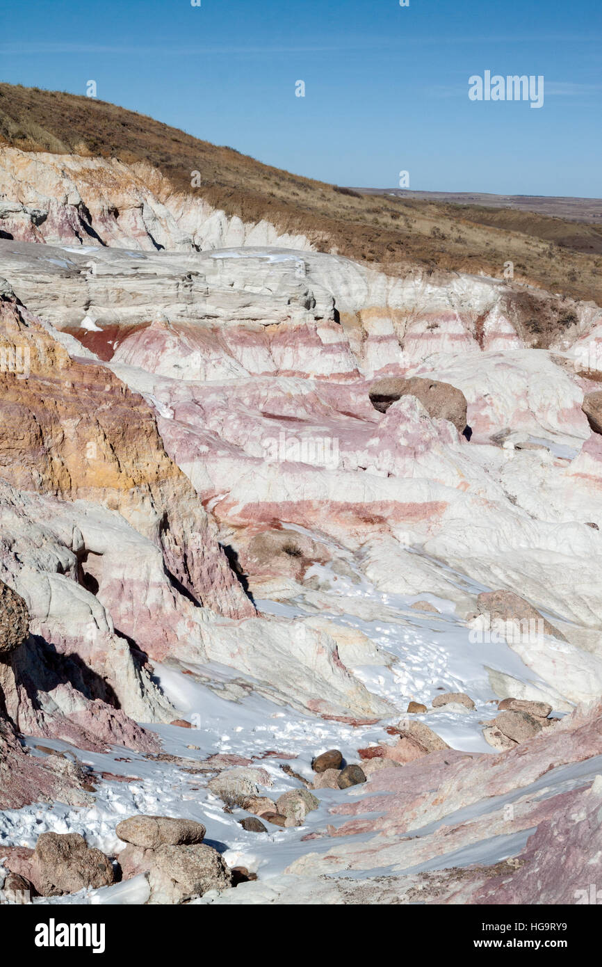 16842. View of clay/sandstone bank showing colorful inclusions that ...