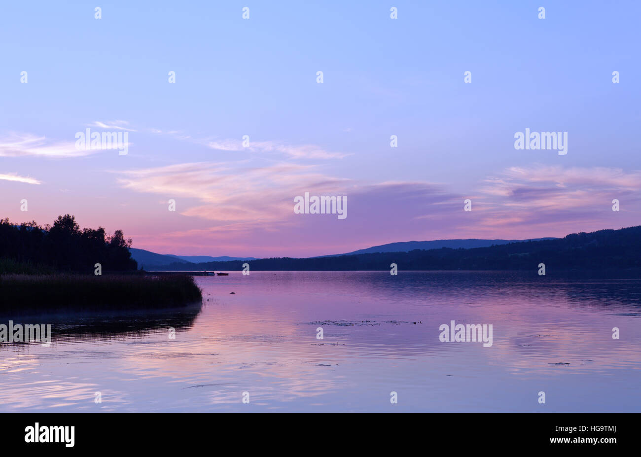Nordic night and Nordic light during June, July and August. Sea or lake ...