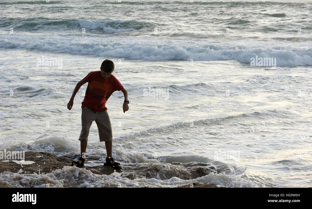 Boy on the shore of the Mediterranean Sea in Israel Stock Photo - Alamy