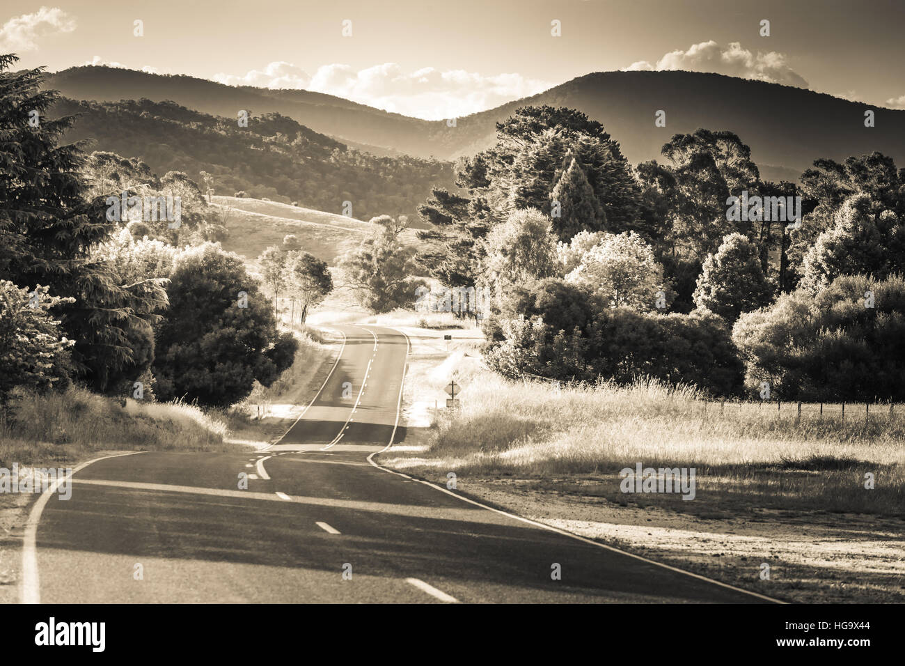Black and white landscape with road and clouds hi-res stock photography ...