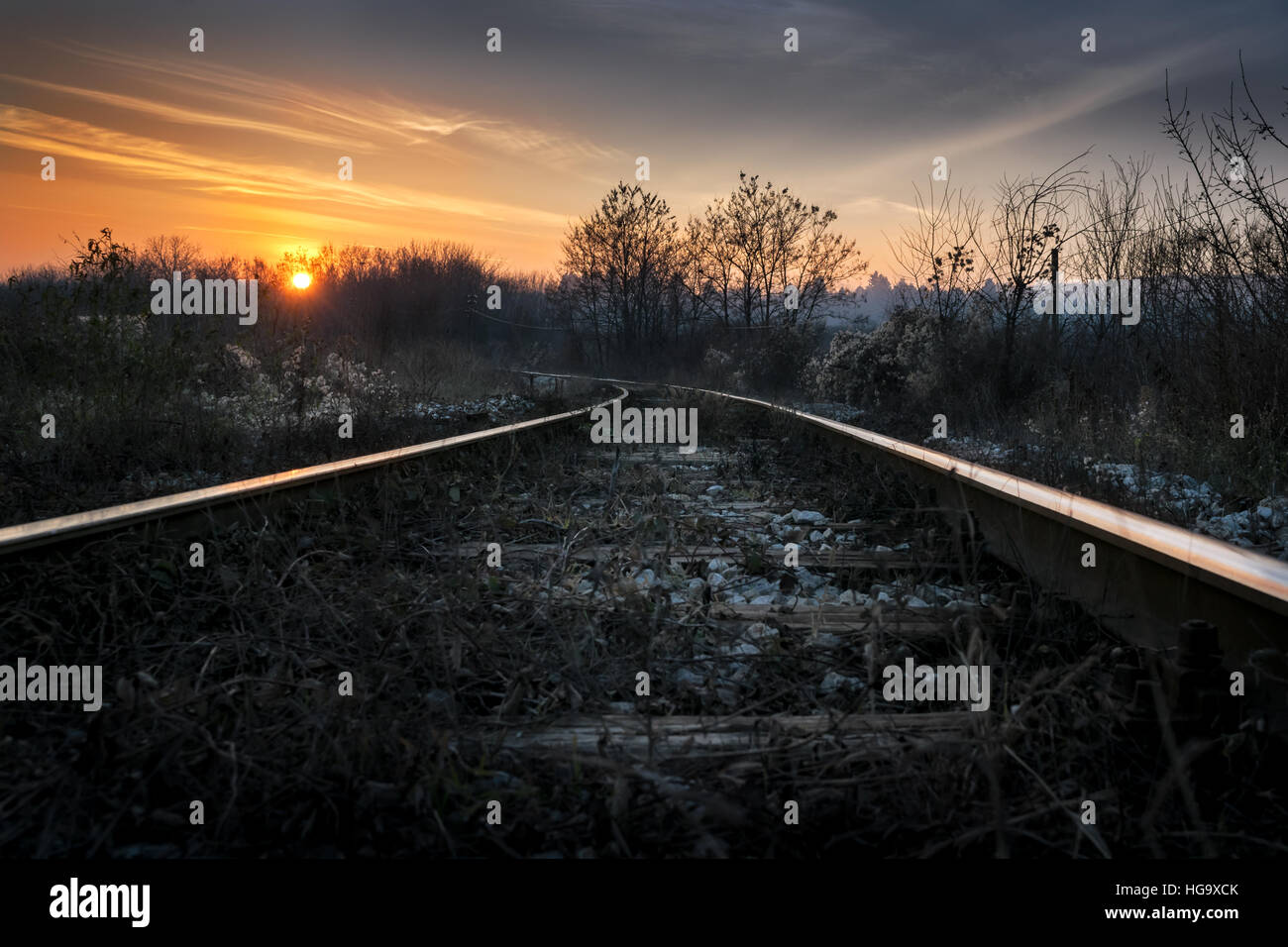 Railroad track with sun hi-res stock photography and images - Alamy