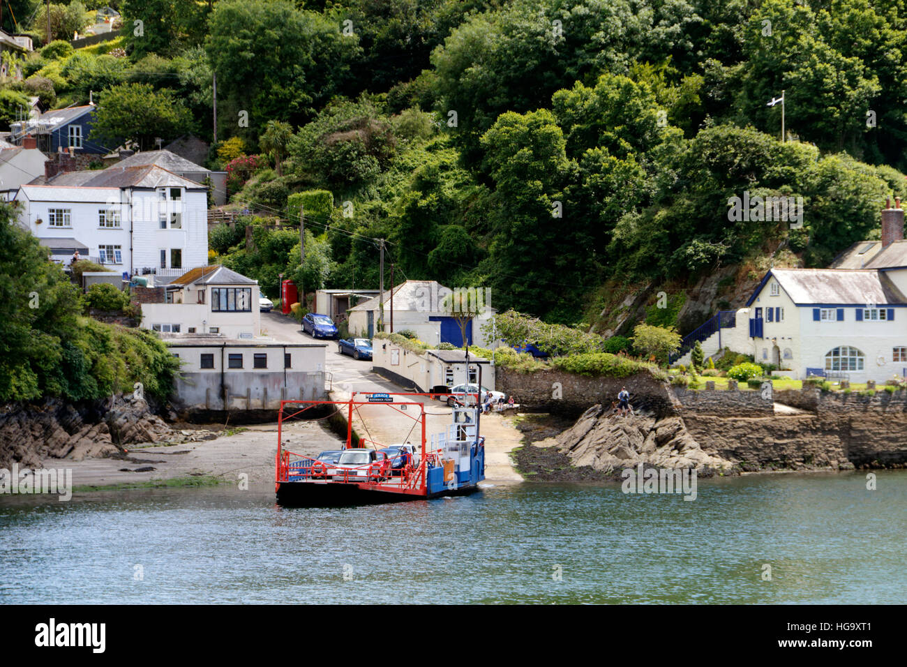 A car and passenger ferry at Bodinnick crossing the river to Fowey in ...