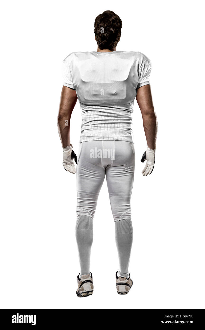 Football Player with a white uniform walking, showing his back on a ...
