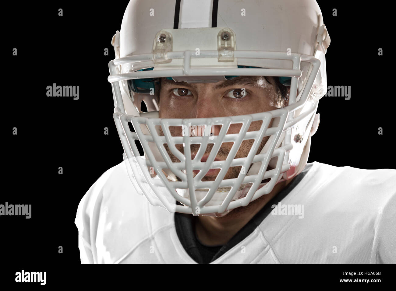 Close up in the eyes of a Football Player with a white uniform on a ...