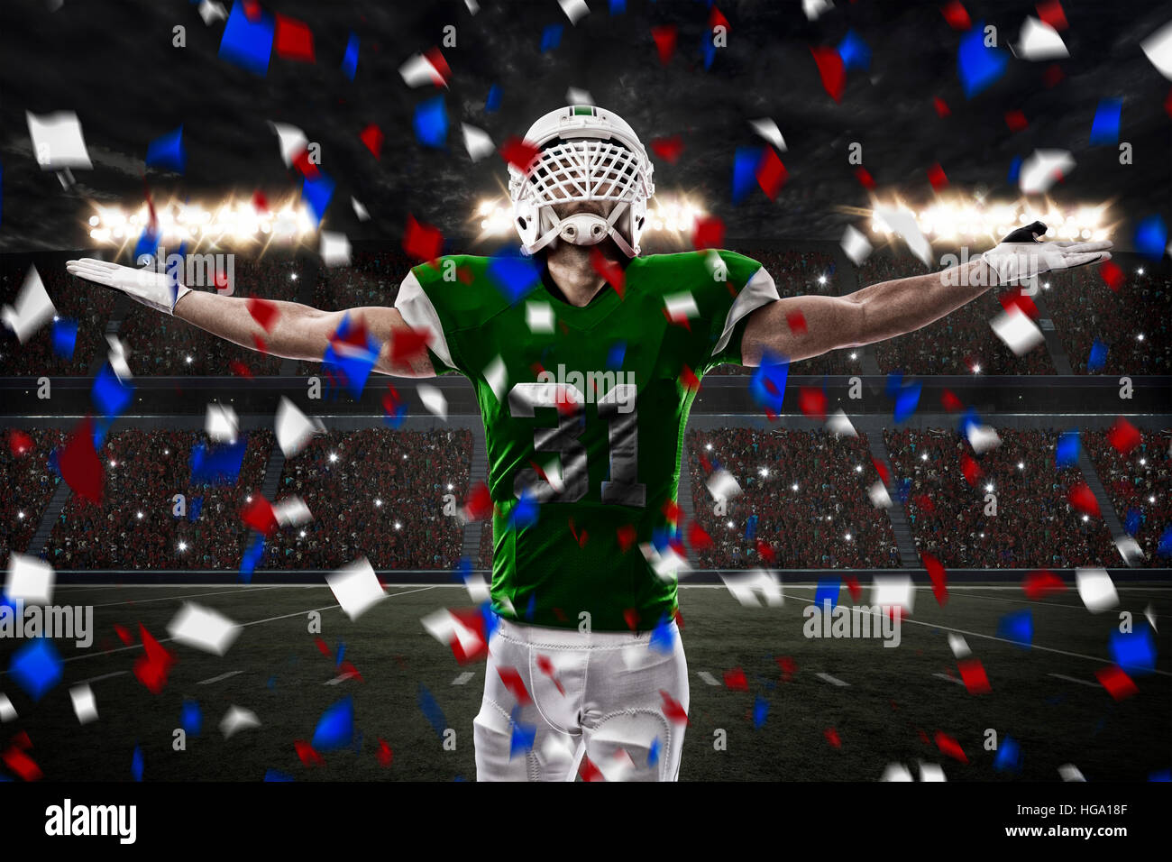 Football Player with a green uniform celebrating, on a stadium Stock ...