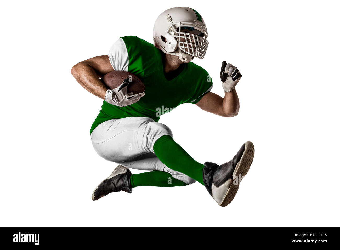Football Player with a Green uniform Running on a white background ...