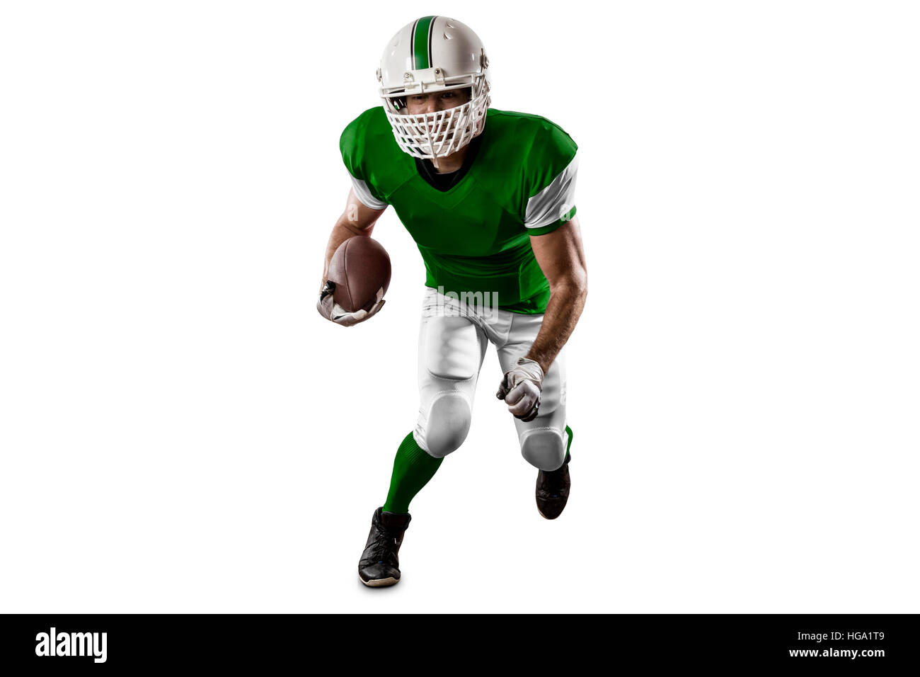 Football Player with a Green uniform Running on a white background ...