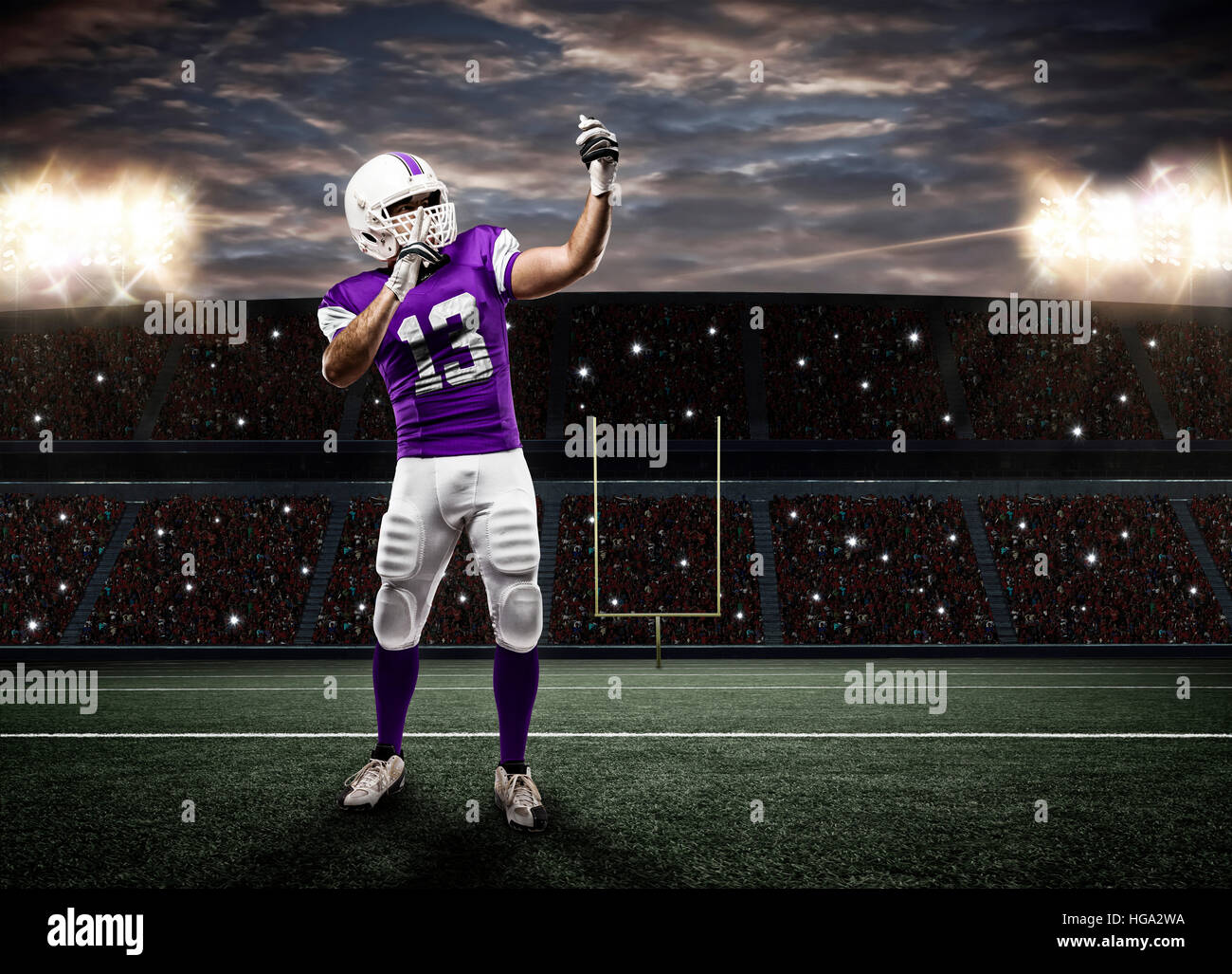 Football Player with a purple uniform making a selfie on a stadium ...