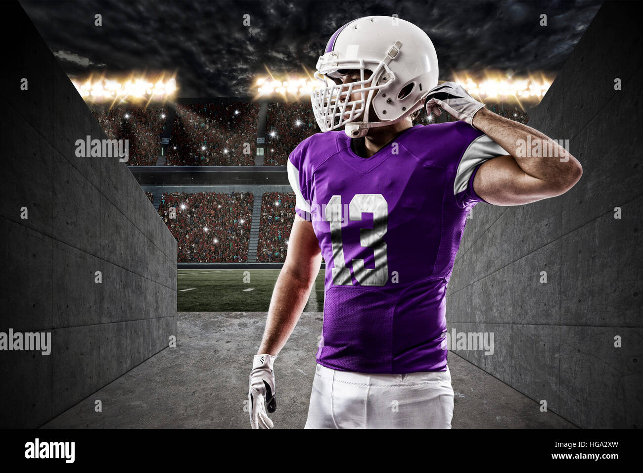 Football Player with a purple uniform on a stadium tunnel Stock Photo ...