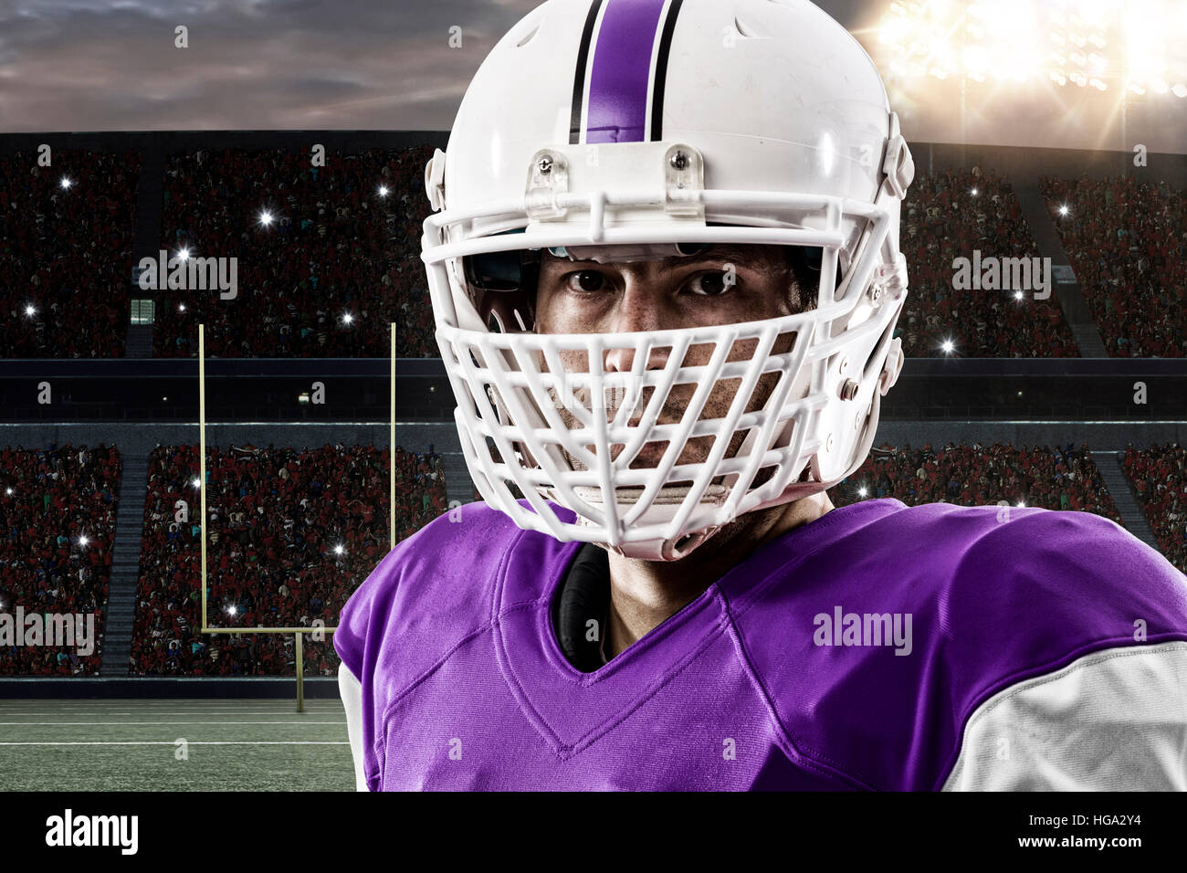 Close up of a Football purple with a white uniform on a stadium Stock ...
