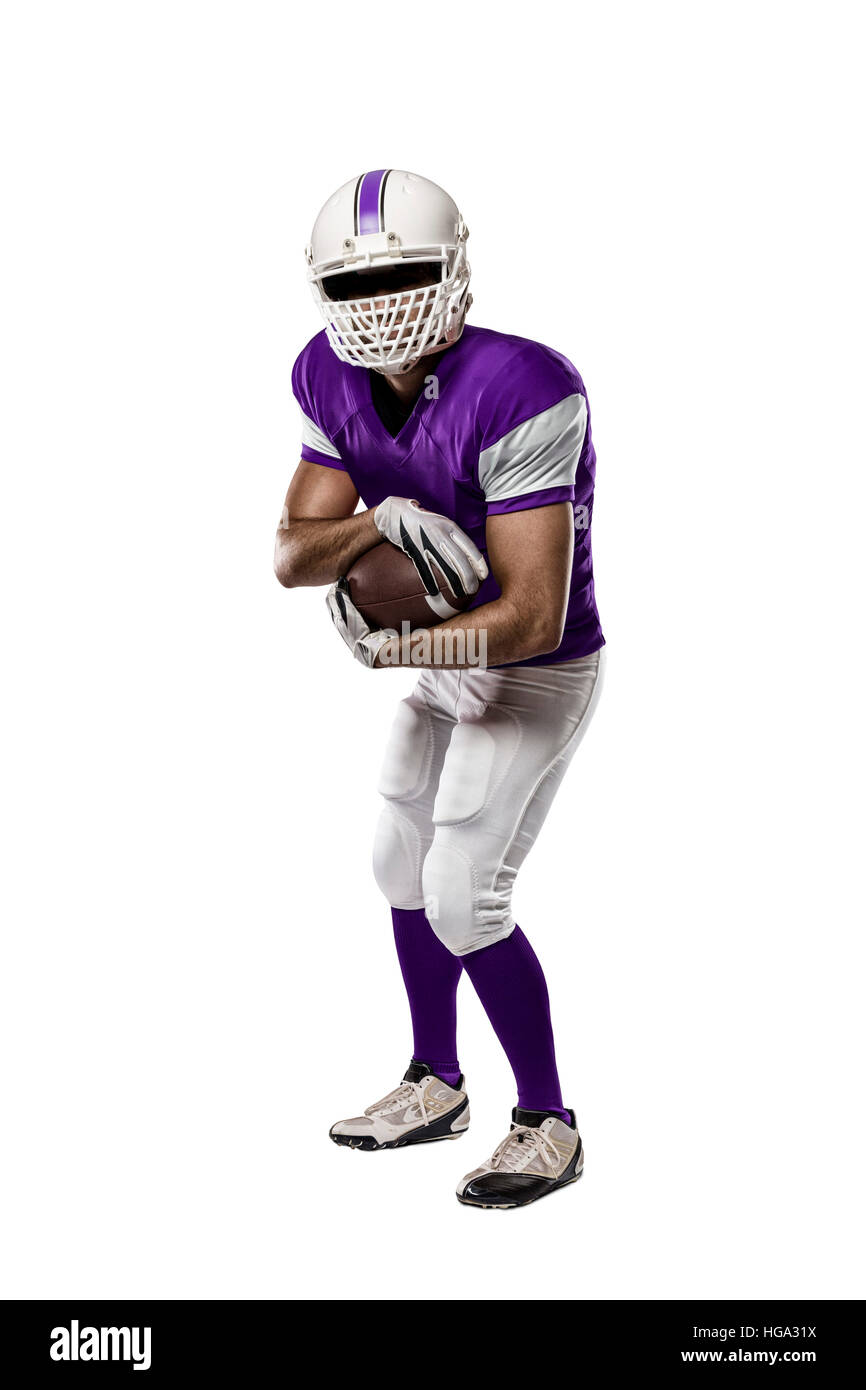 Football Player with a purple uniform on a white background Stock Photo ...