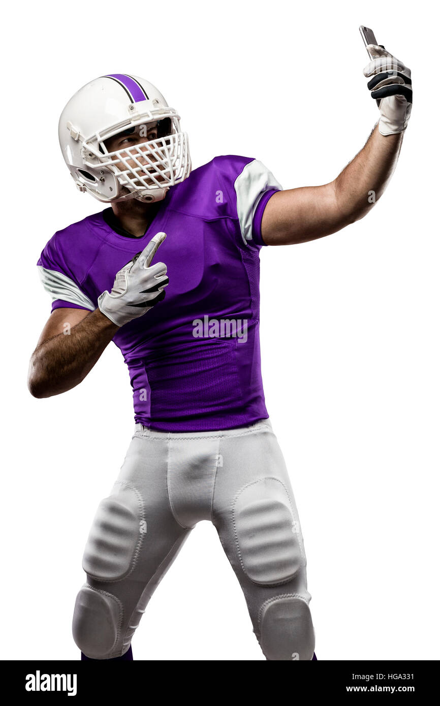 Football Player with a purple uniform making a selfie on a white ...