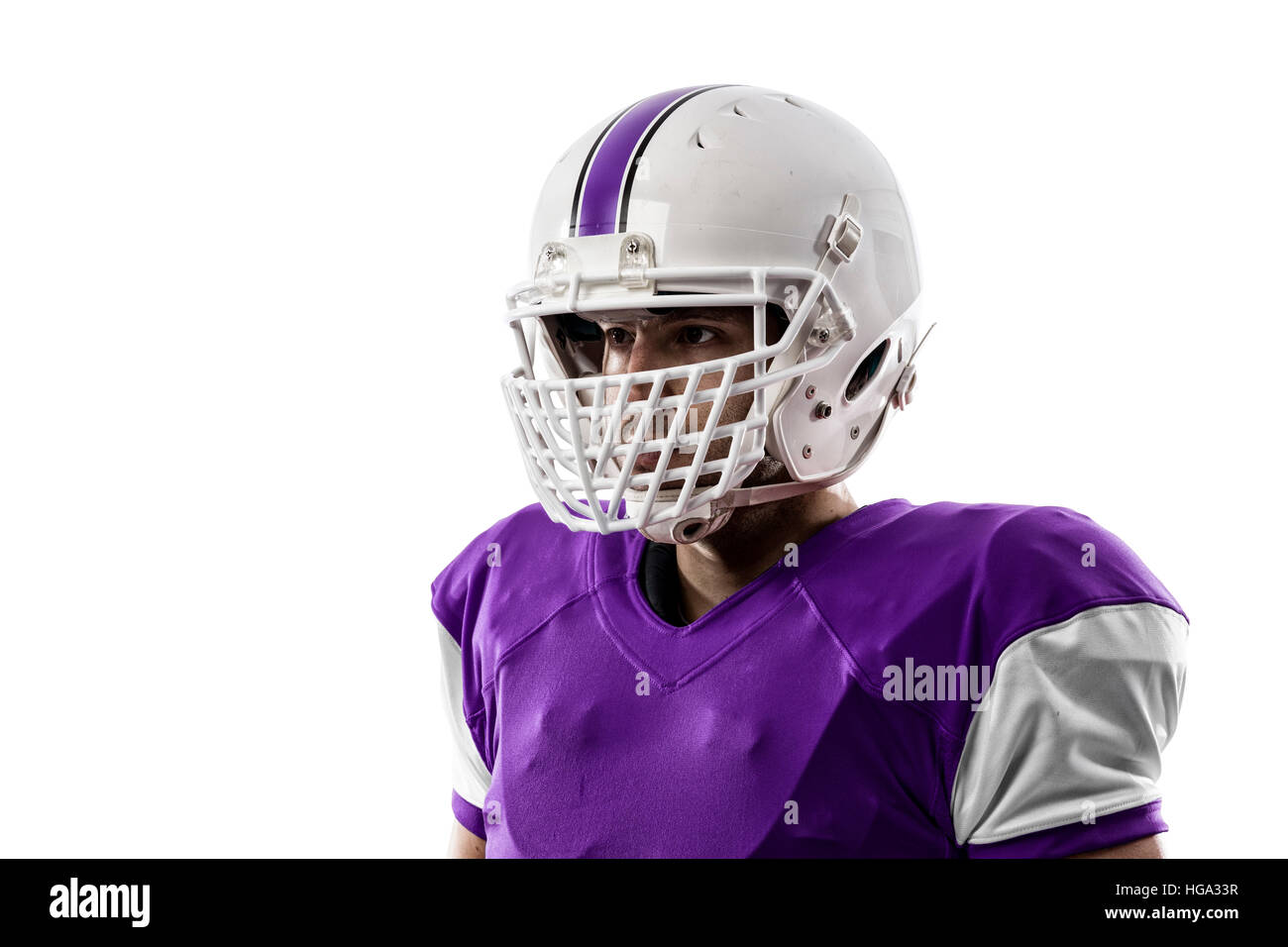 Close up of a Football Player with a purple uniform on a white ...