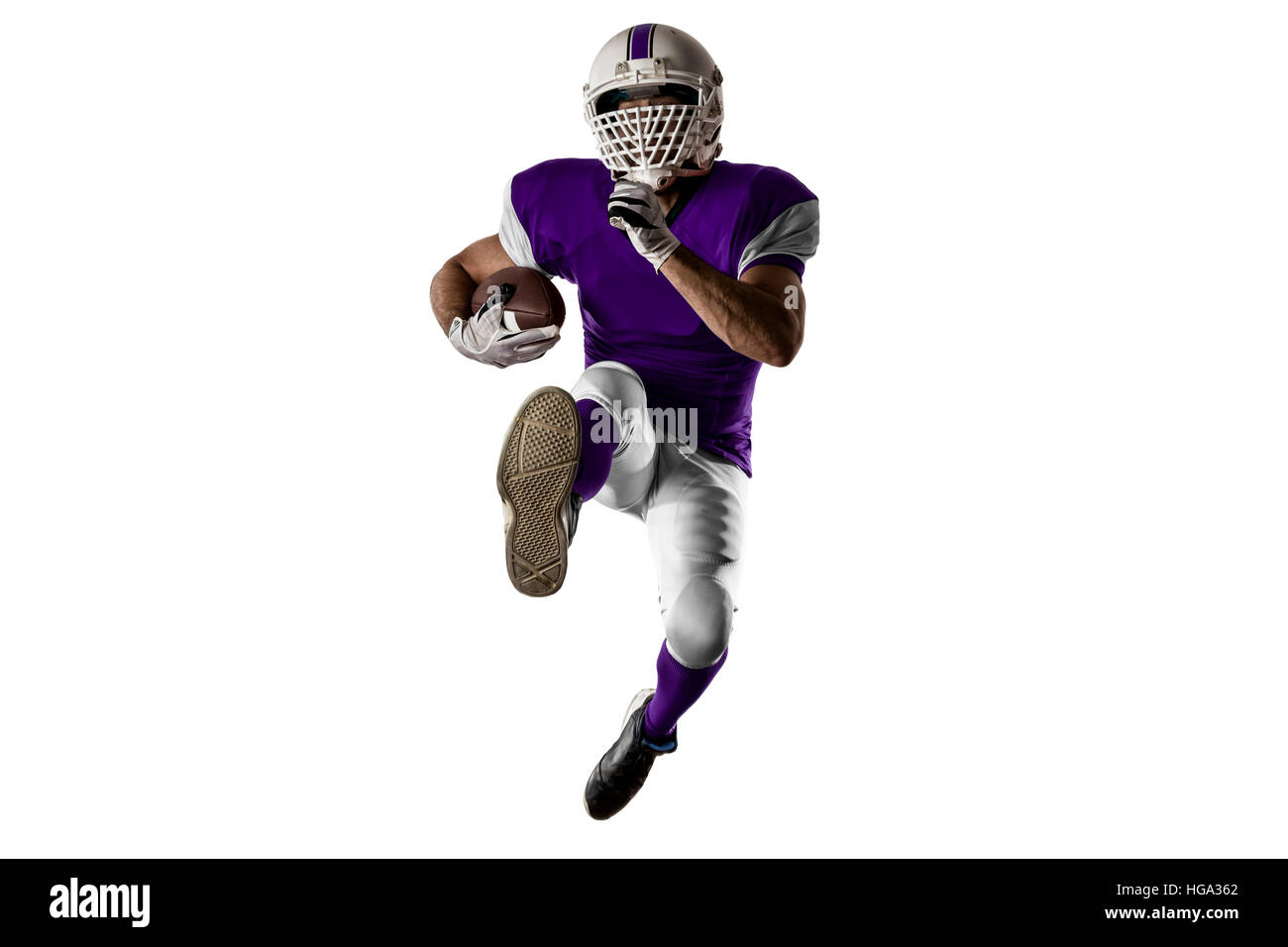 Football Player with a purple uniform Running on a white background ...