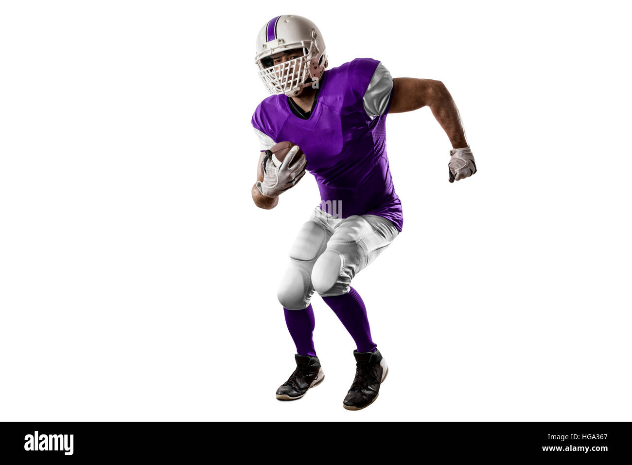 Football Player with a purple uniform Running on a white background ...