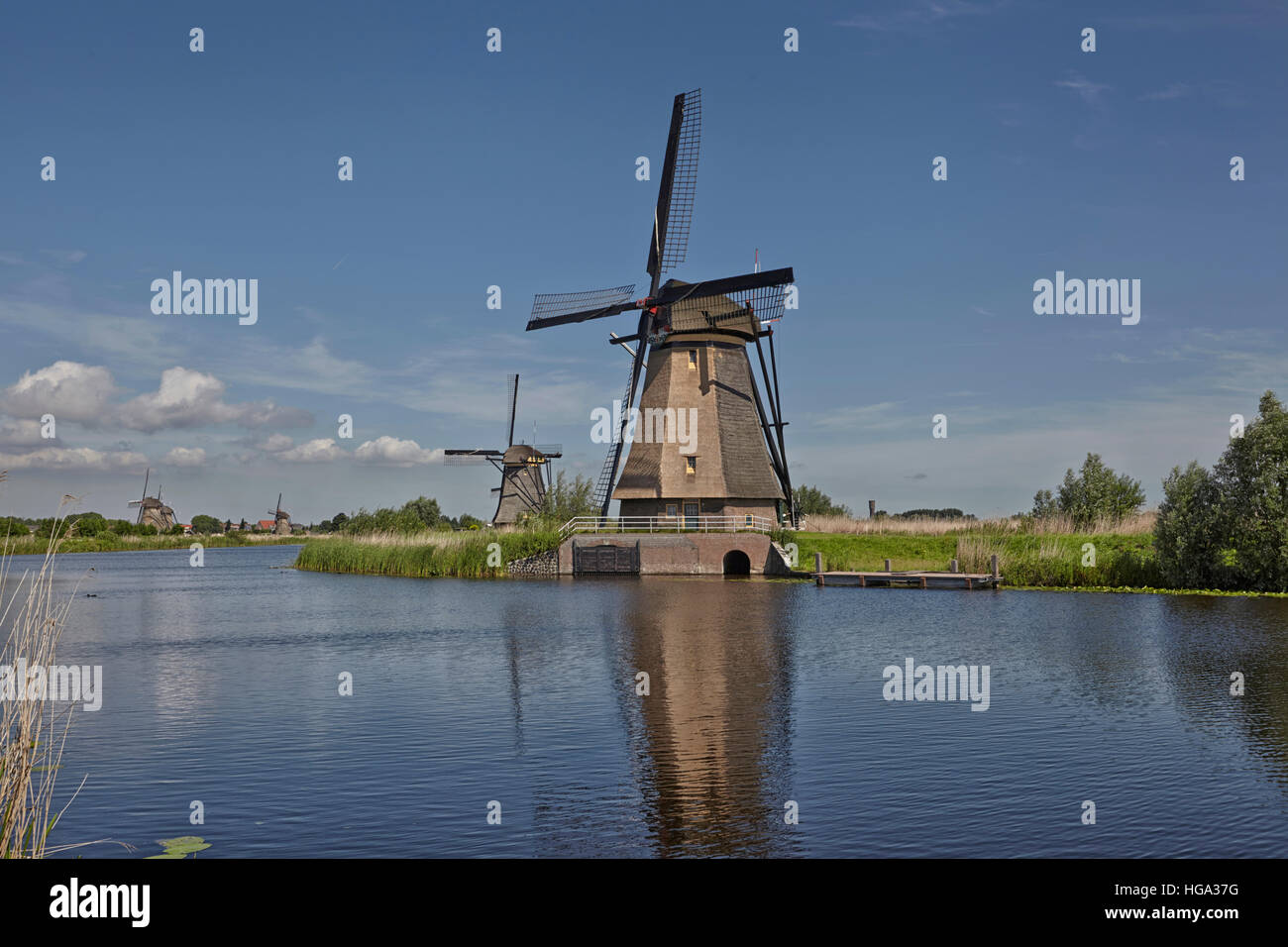 Several dutch stone brick windmills at Kinderdijk, an UNESCO world ...