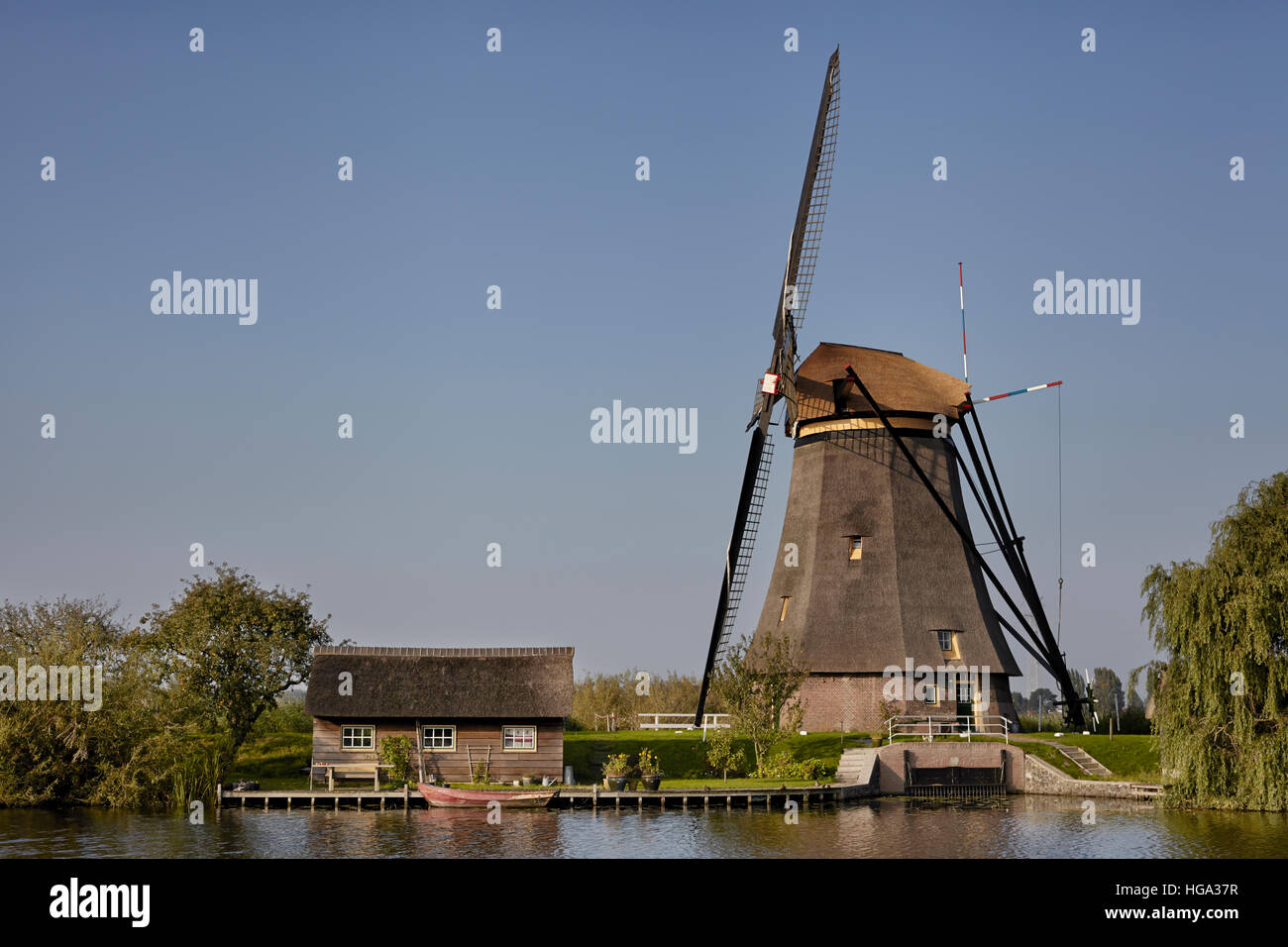 Dutch windmill at Kinderdijk, an UNESCO world heritage site. Stone ...