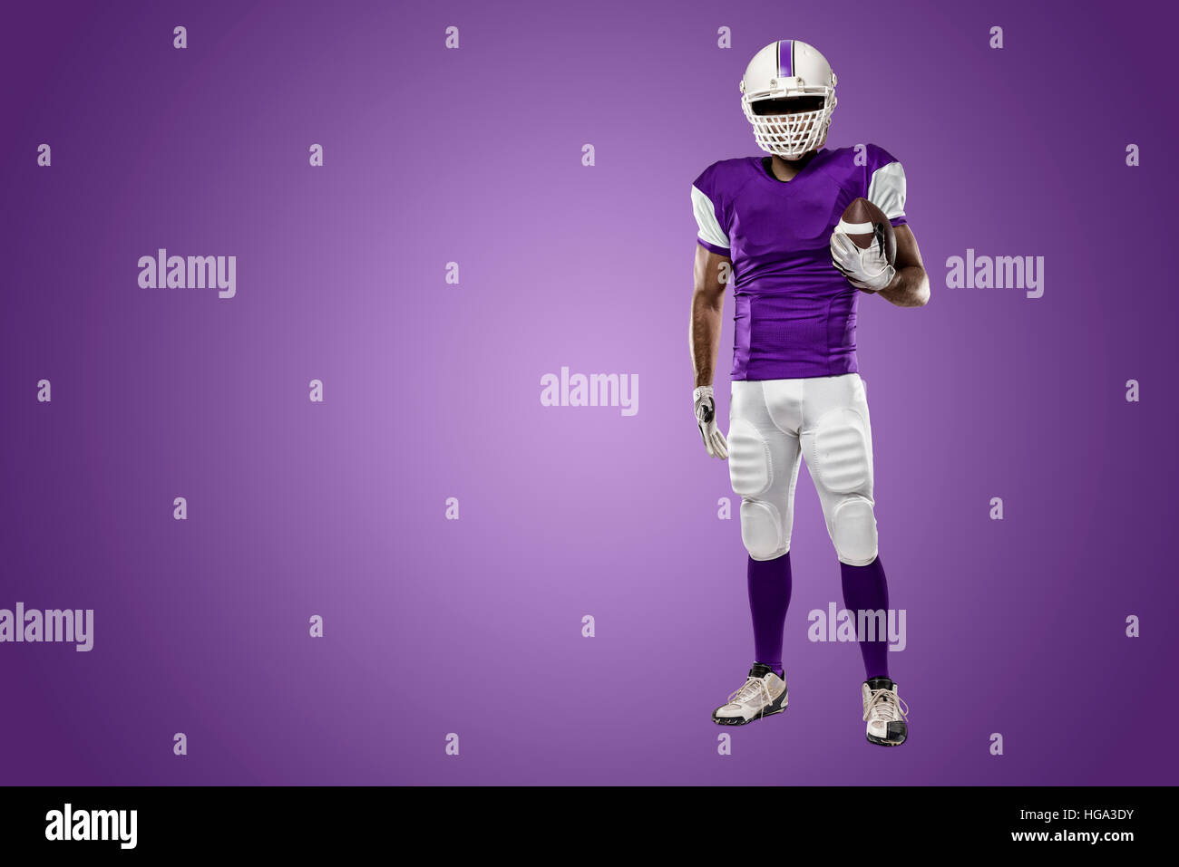 Football Player with a purple uniform on a purple background Stock ...